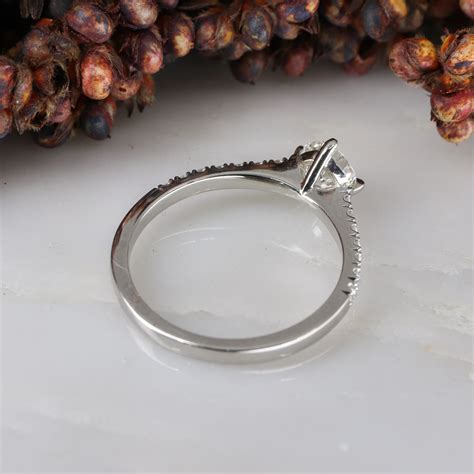 Platinum Compass Set Solitaire Ring With Round Brilliant Cut White