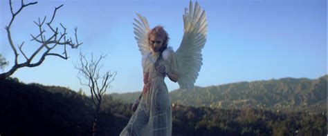 Watch Grimes New Video For Flesh Without Blood Life In The Vivid Dream Complex