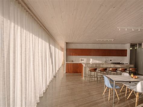 Emergentes Architectures Sàrl creates trapezoidal beach house