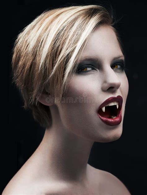 Dont Let Her Seduce Youa Seductive Female Vampire Baring Her Fangs