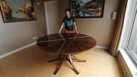 A Clever Circular Table That Expands To Twice Its Size With A Simple
