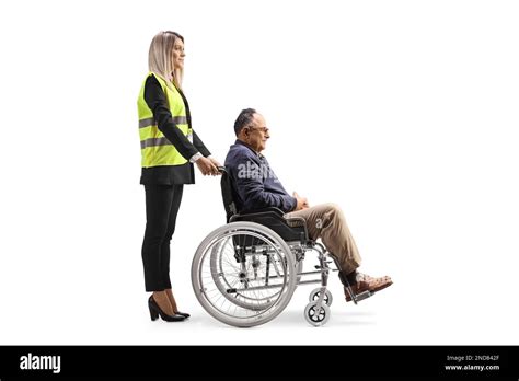 Female Special Assitance Worker Standing With A Marture Man In A