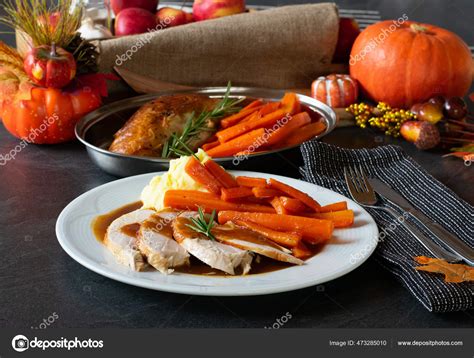Roast Turkey Breast Gravy Mashed Potatoes Caramelized Carrots Served