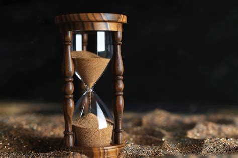 Premium Photo Elegant Hourglass With Flowing Sand Space For Copy