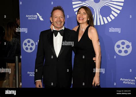 Musician Simon Kirke Left And Wife Maria Angelica Attend The Film
