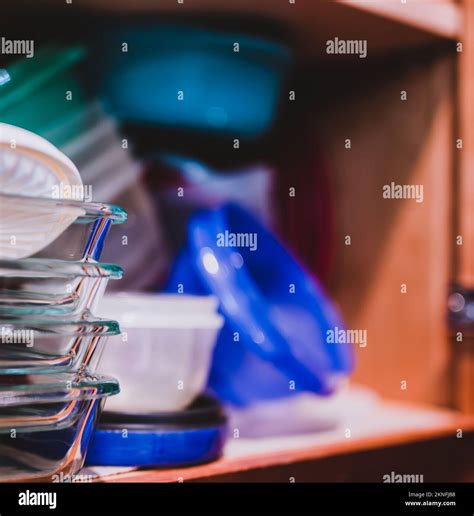 Narrow Depth Of Field Picture Of An Open Kitchen Cabinet With An