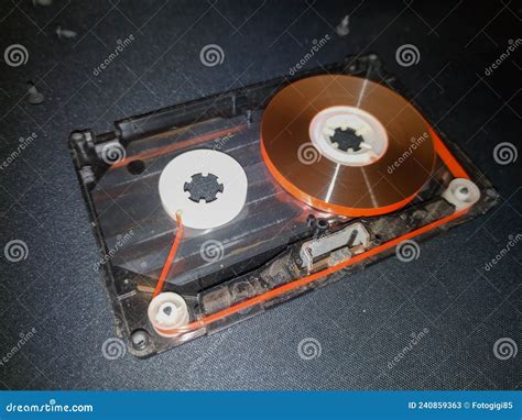 Disassembled Vhs Cassette Components In The Background Stock