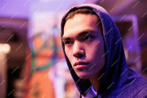 Free Photo Focused Asian Hacker Hacking Server