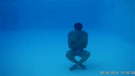 Barefaced Cutie Underwater In Bulging Speedo