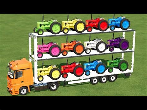 TRANSPORTING COLORED MINI ZETOR TRACTORS TO THE GARAGE WITH TOP TOP