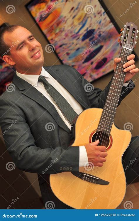 Guitar Player On Stage Presentation Of The Rock Group`s Concerts