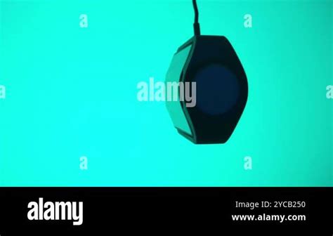 A Professional Colorimeter Measures Color Patches On A Monitor Ensuring Accurate Calibration