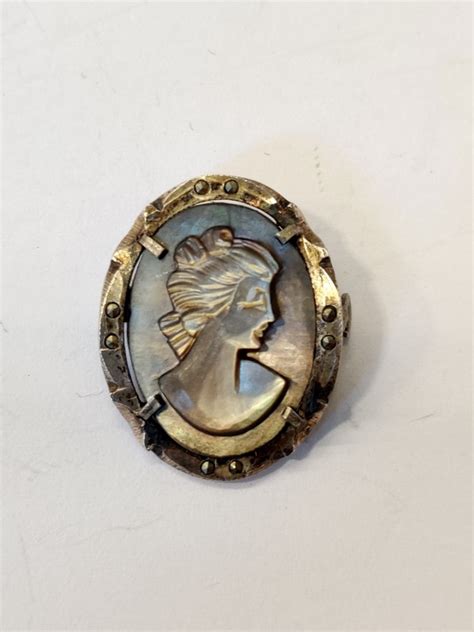 Zilveren Broche Met Vrouwenhoofd Kringwinkel