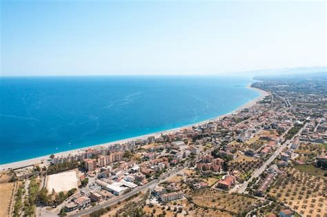Premium Photo | Aerial view of gioiosa marina on summer