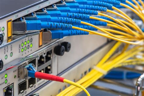Premium Photo Optical Line Terminal With Connected Fiber Optic Patch