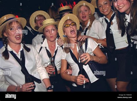 Group Of Girls In St Trinians Fancy Dress On A Night Out At School