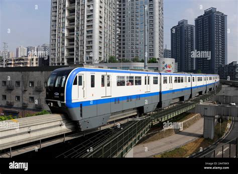 Monorail Train Approaches Sigongli Station On Chongqing Metro Line 3