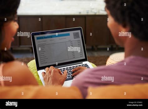Woman Laptop Using Online Banking Hi Res Stock Photography And Images Alamy