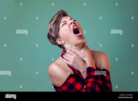 People And Emotions A Portrait Of Young Woman With Short Hair Choking