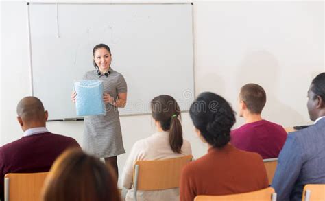 Female Coach Presents The Product In Audience At Business Training