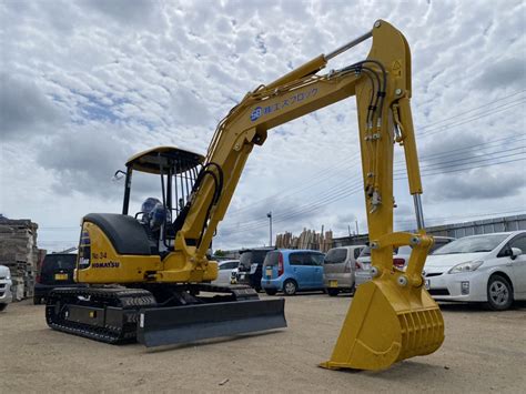 柏本社0 2バックホウ納車 株式会社エスブロック 住宅や地域のブロック、外構、造成、解体、水道工事