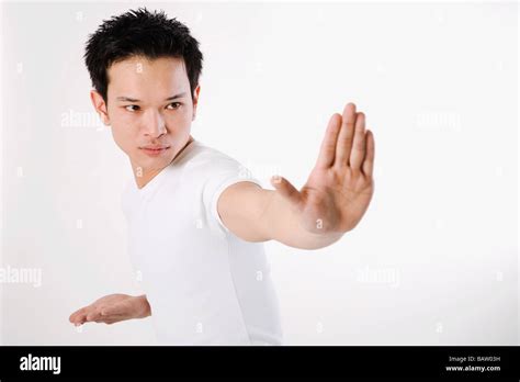 Asian Man Doing Martial Arts Exercises Stock Photo Alamy