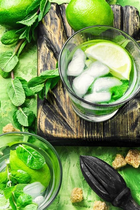Mojitos Cocktail With Lime And Mint Leaves Stock Image Image Of Cocktail Highball 90388617
