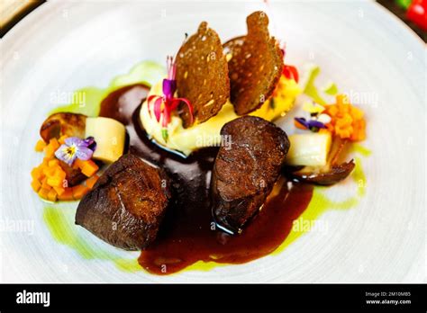 Deer Tenderloin Truffle Potato Puree Porcini Mushrooms Baked Leek