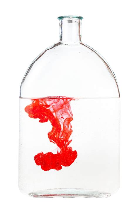 Premium Photo Red Ink Dissolves In Water In Glass Flask Isolated