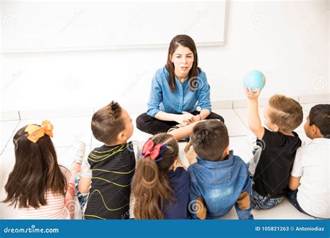 Preschool Class Sitting On The Floor Stock Image Image Of Group People 105821263