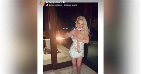 Britney Spears Caresses Her Cleavage In Provocative Video Photos
