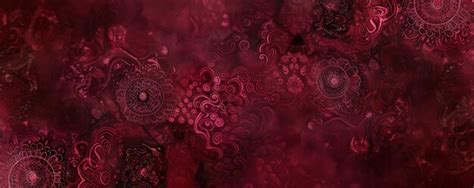 A Rich Burgundy Background With Intricate Lacelike Patterns In Shades