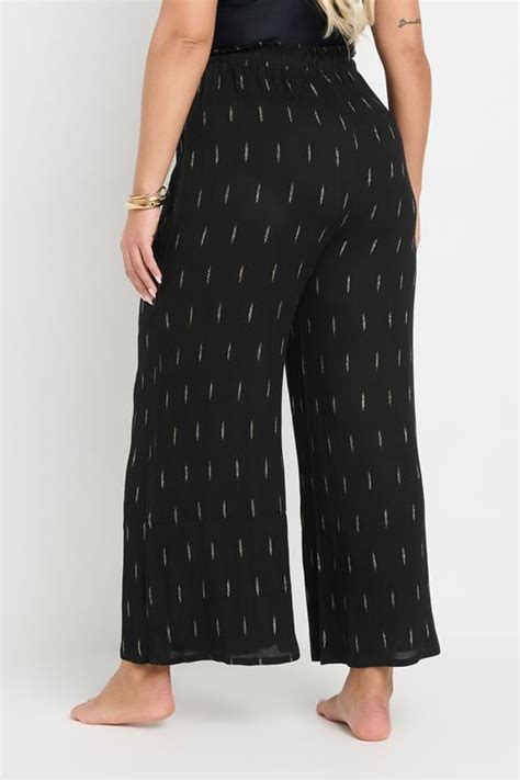 Yours Plus Size Black Metallic Dobby Beach Trousers Yours Clothing