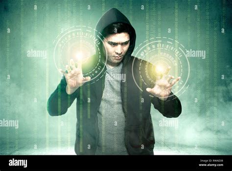 Young Asian Hacker In Black Hoodie Touching Virtual Screen With Binary