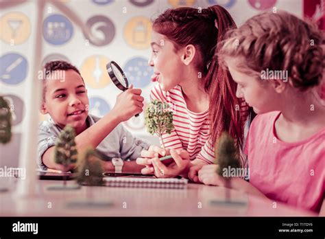 Ginger Mischievous Girl Showing Tongue To Her Classmate Stock Photo Alamy