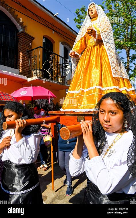 Mexican Women Carry The Palanquin Of Virgin Mary During During The Good