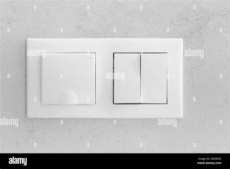 Closed Socket And Switch On Porcelain Stoneware In The Bathroom Stock