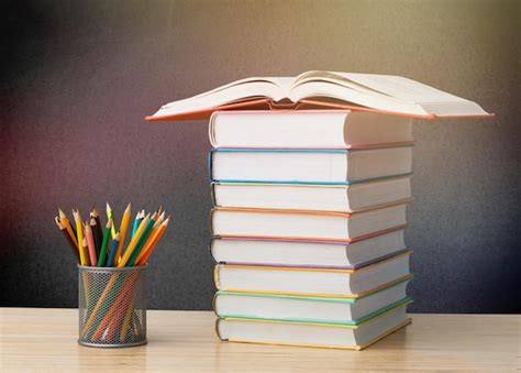 Premium Photo Big Stack Of Books On Table