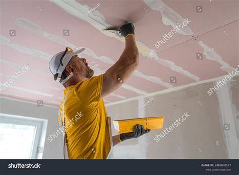 Worker Make Plasterboard Ceiling He Does Stock Photo Shutterstock