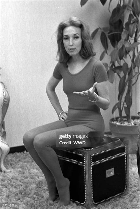 Cosmopolitan Editor Helen Gurley Brown Doing Exercise In Her Office
