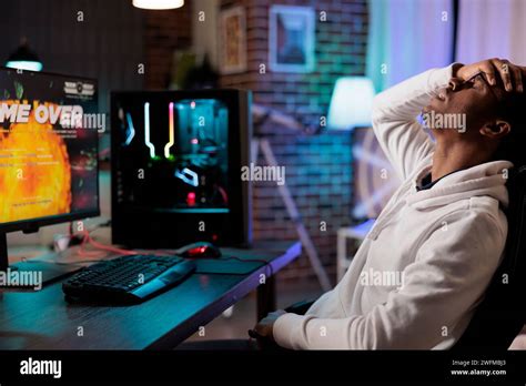 Gamer Upset After Losing Online Multiplayer Action Videogame Match