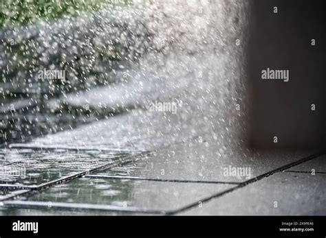 Captivating Scene Of Water Splashing Dynamically On Glossy Wet Tiles