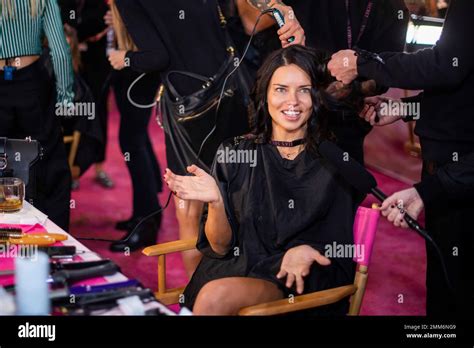 Adriana Lima Appears Backstage During Hair And Makeup At The 2018