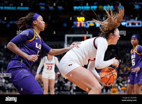 Virginia Techs Elizabeth Kitley Is Fouled By Lsus Ladazhia Williams