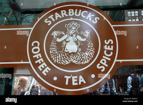 Starbucks Logo At A Starbucks Coffee Kiosk In Bryant Park In New York Stock Photo Alamy