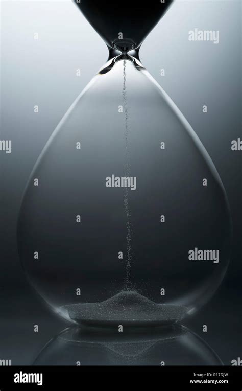 Traditional Hourglass Egg Timer With Grains Of Sand In Bottom Half Showing The Beginning Of Time