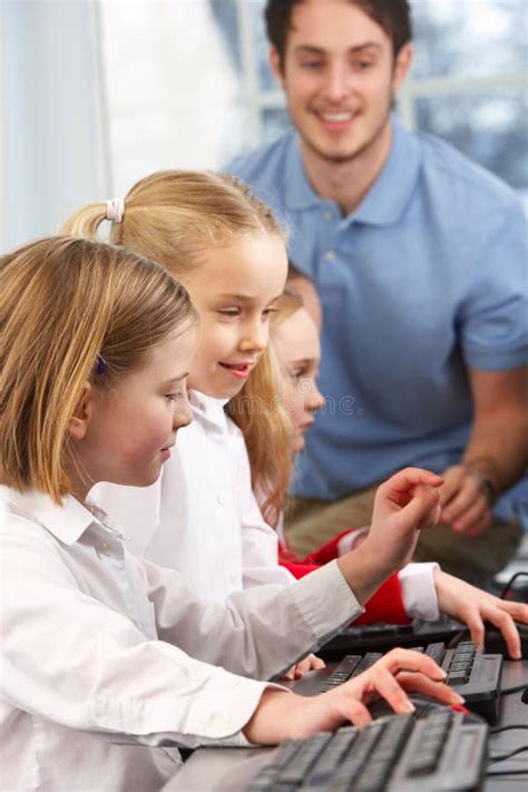 Girls Using Computers In Class With Teacher Stock Image Image Of Adult Confidence 22776211