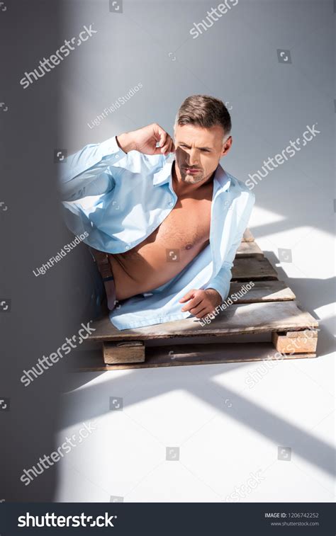 Attractive Adult Man Lying On Wooden Stock Photo Shutterstock