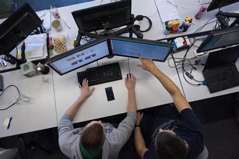 Young Programmers Writing Programming Code Top View 12437508 Stock