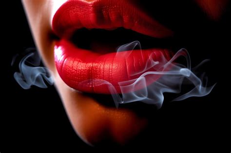 Premium Ai Image A Woman With Red Lips And Smoke Coming Out Of Her Mouth